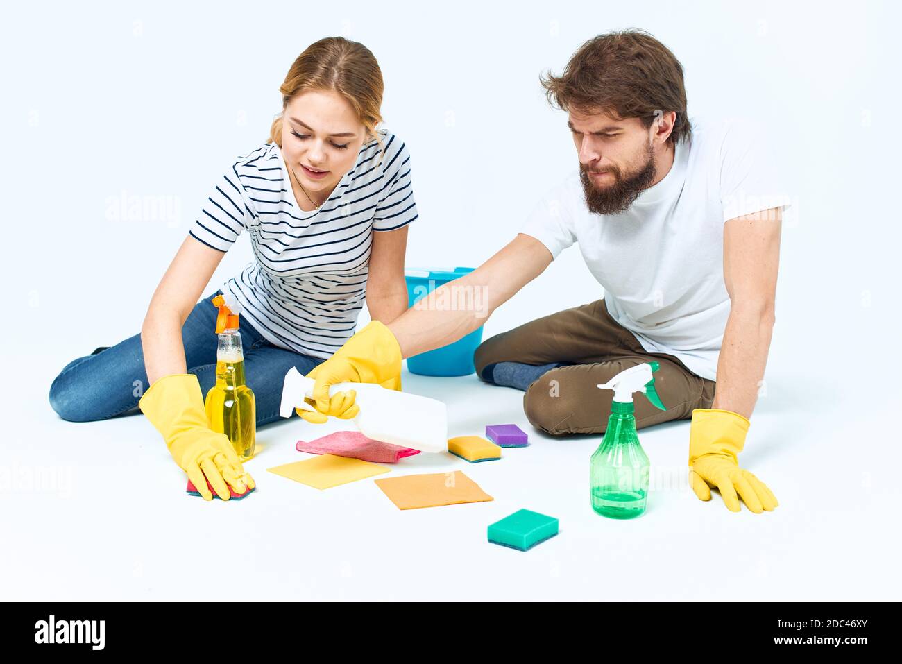 Man and woman detergent lifestyle cleaning teamwork Stock Photo - Alamy