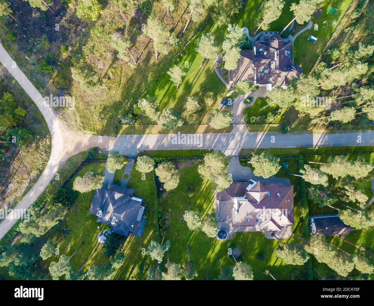 View from above of road and modern private houses in country cottage ...