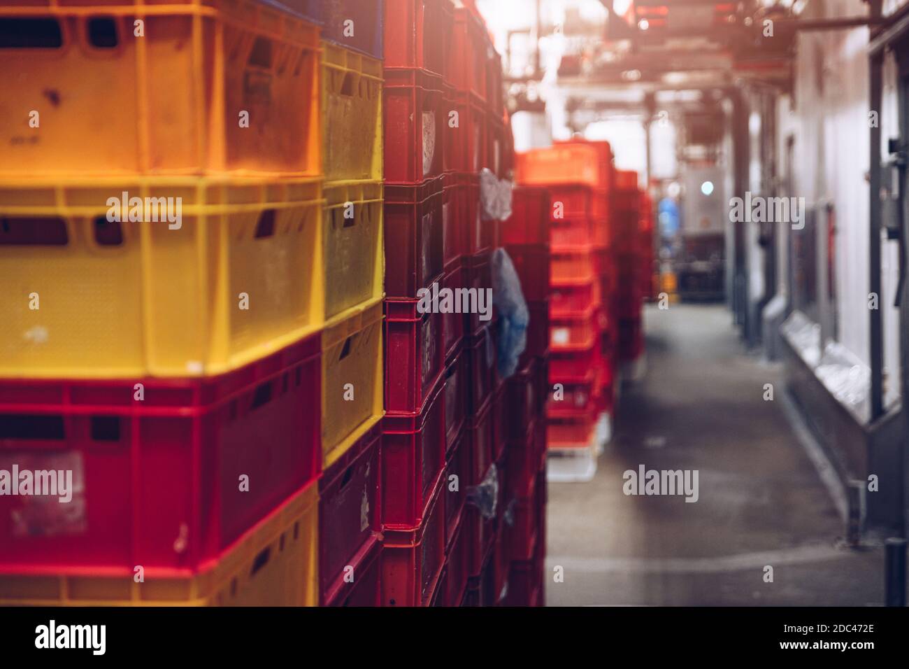Colorful plastic boxes in stock Stock Photo - Alamy
