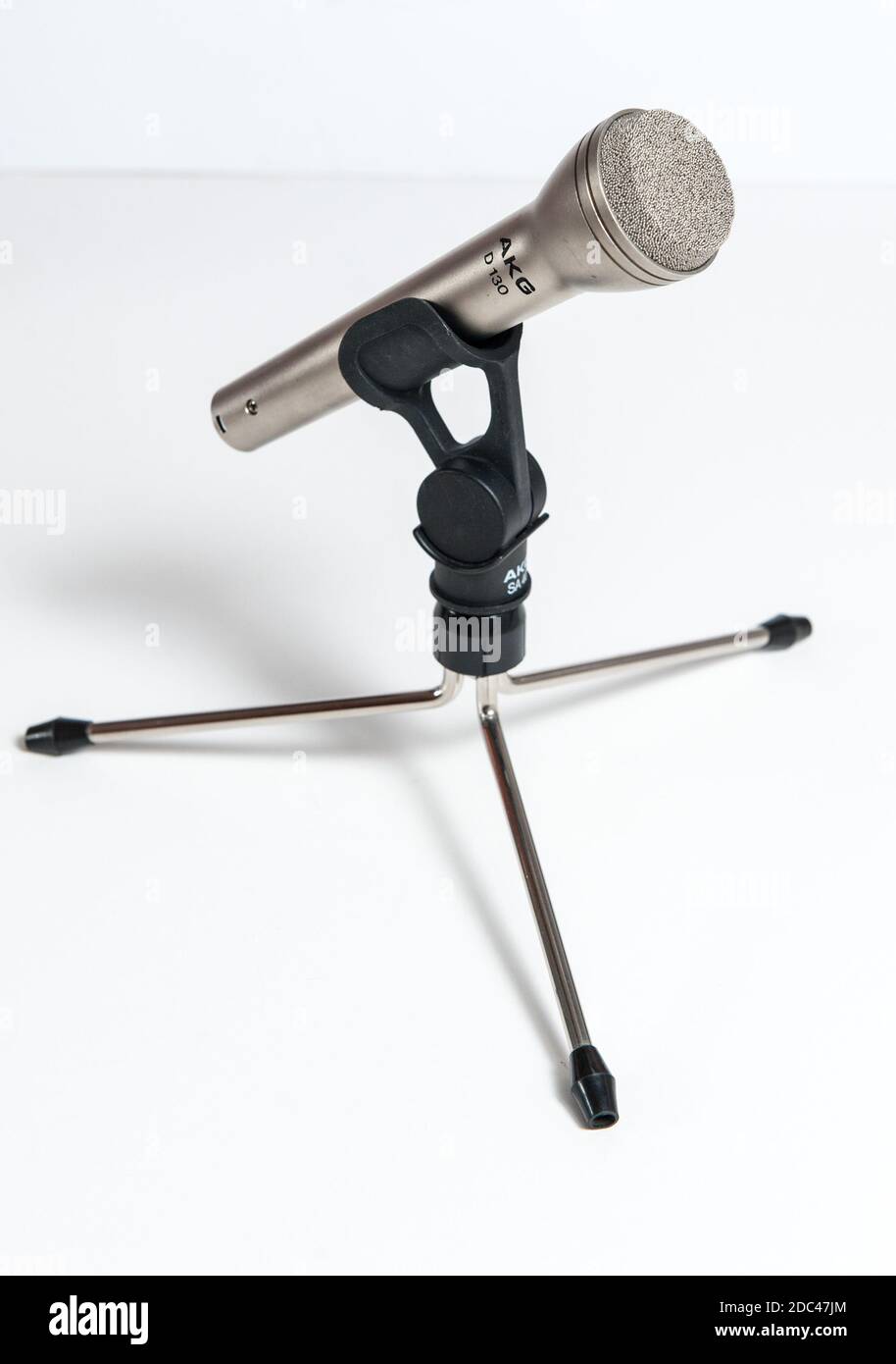 Handheld microphone on stand Stock Photo - Alamy