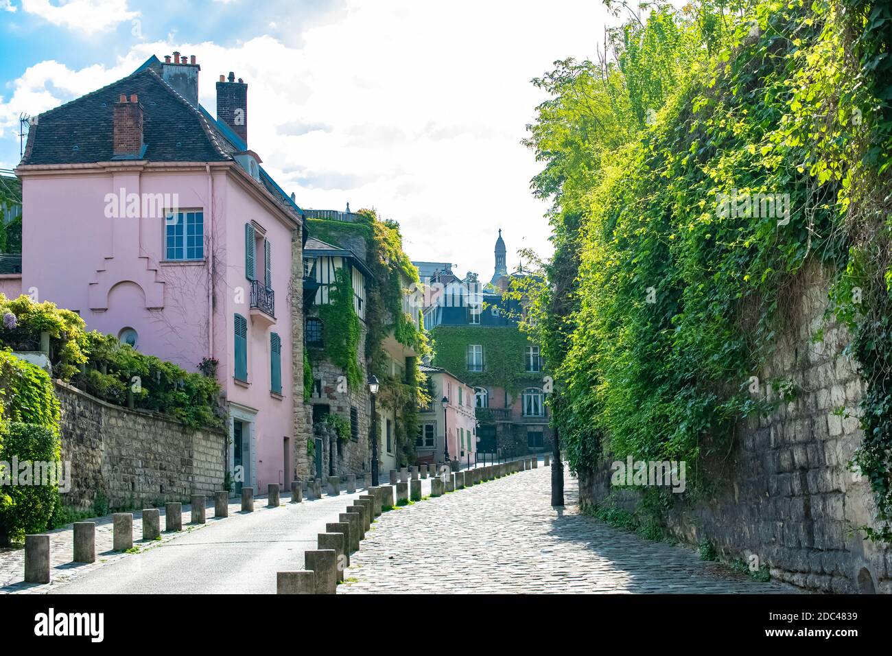 Paris, France, famous pink house and buildings in Montmartre, in a ...