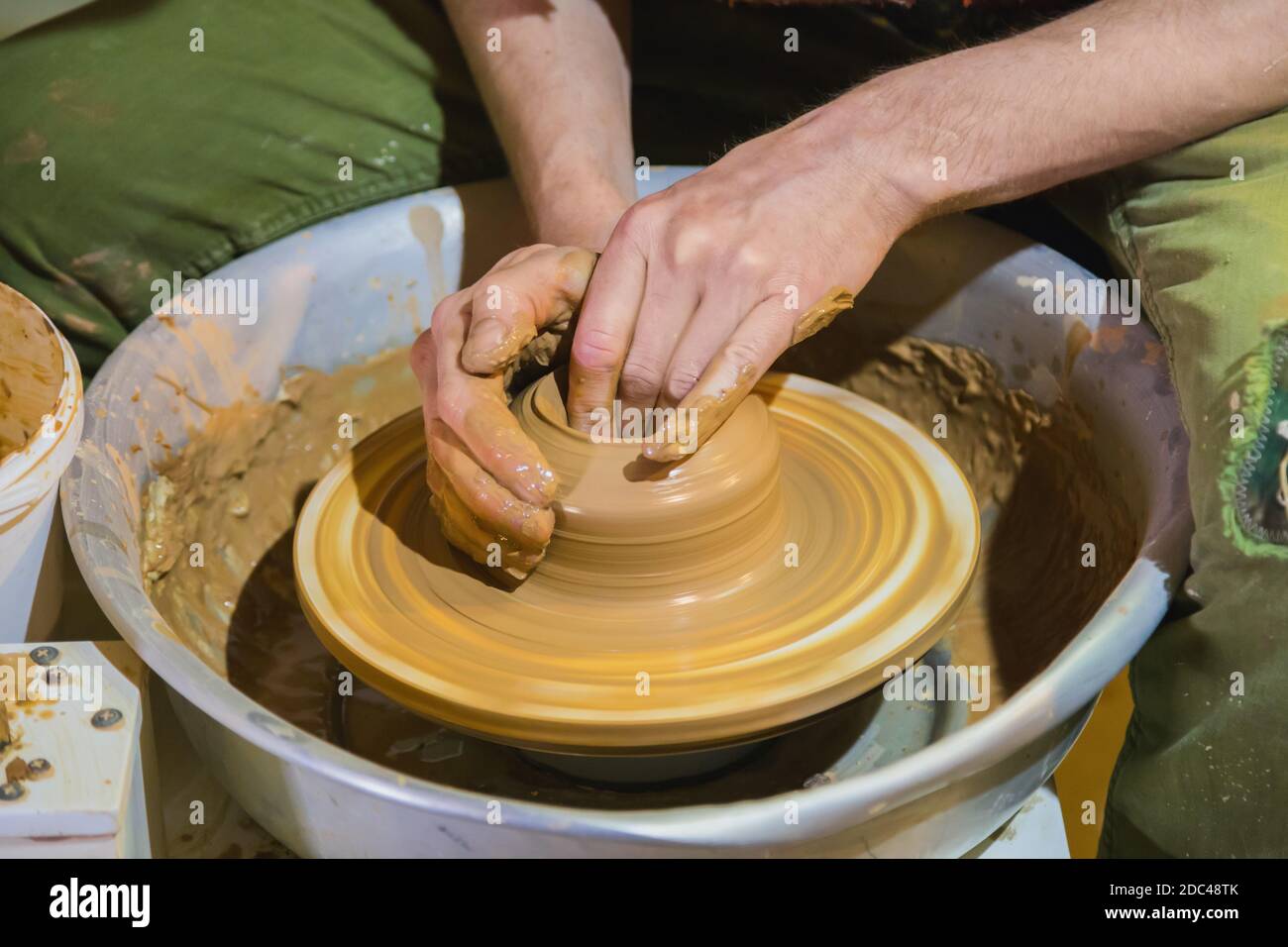 Male potter making pot in hi-res stock photography and images - Alamy