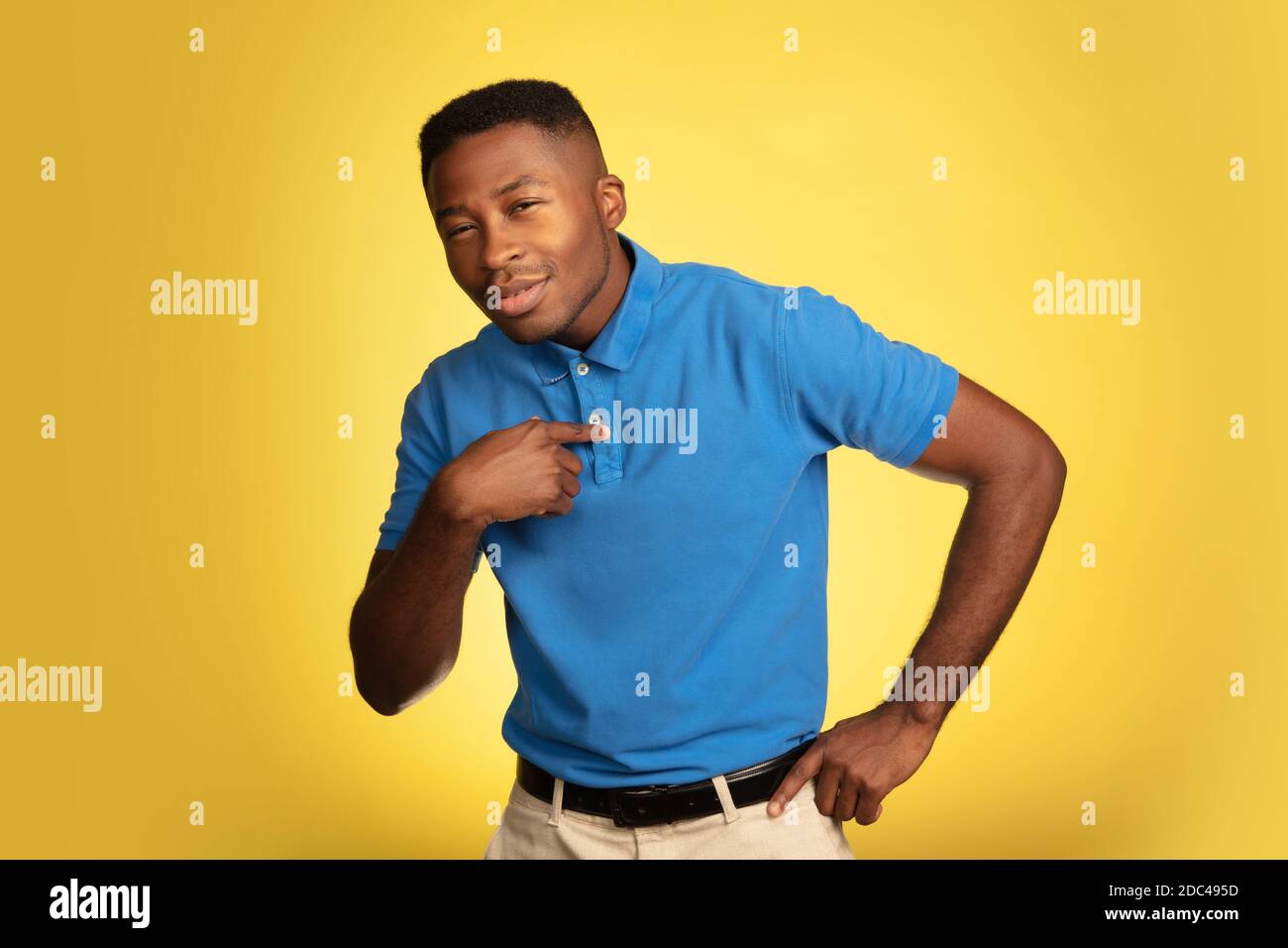 Pointing at himself. Young african-american man's portrait isolated on ...