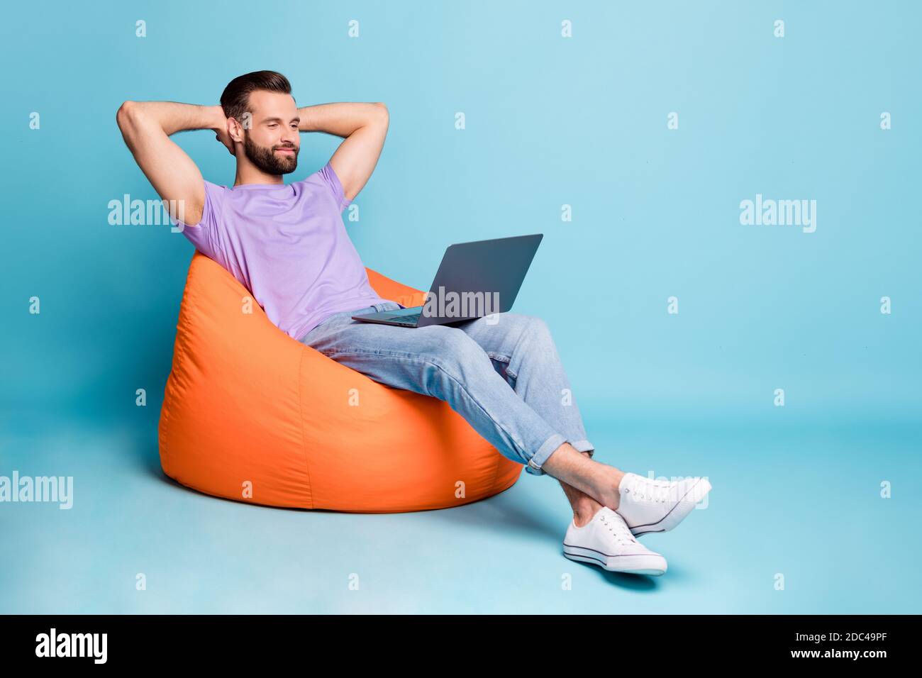 Full length body size photo of bearded programmer chilling during break ...