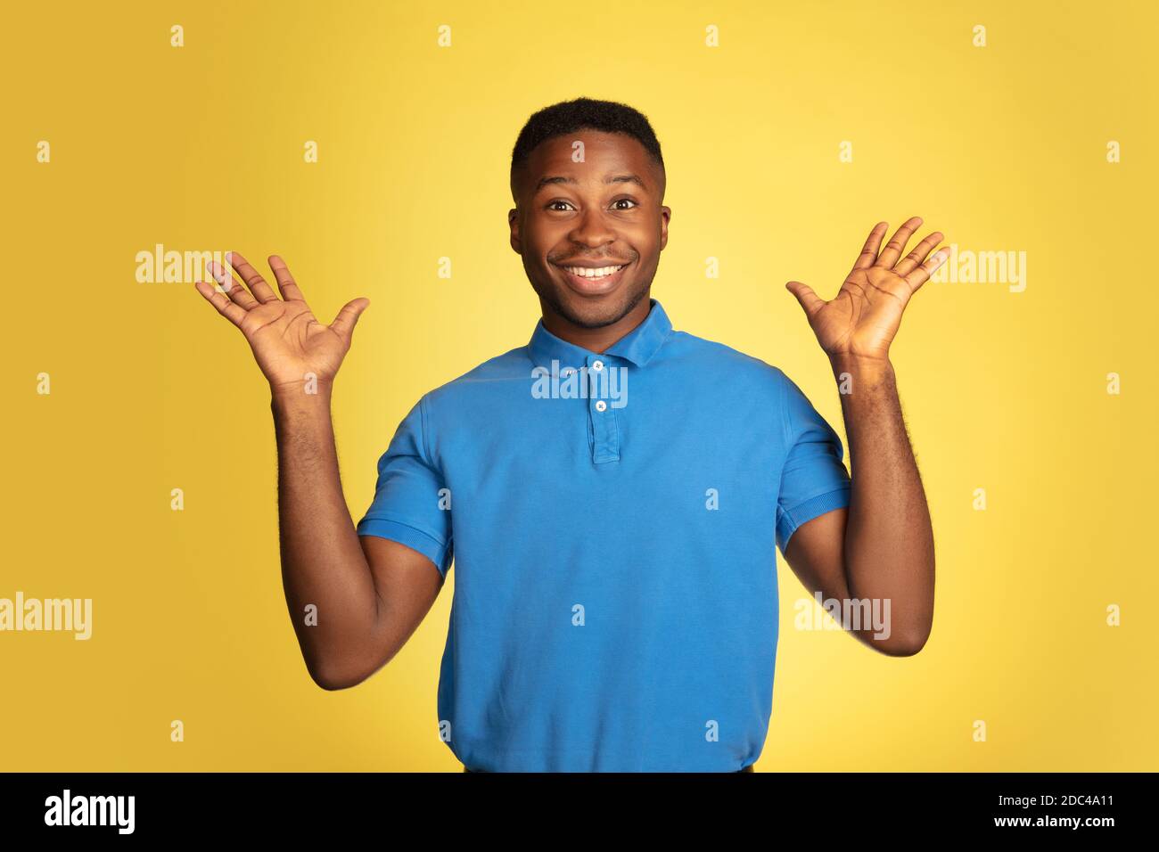 Wondered, surprised. Young african-american man's portrait isolated on ...