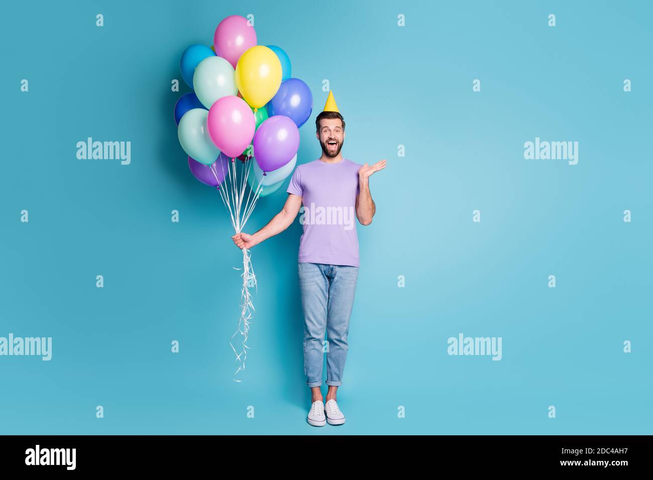 Full length body size photo of excited birthday man pile of balloons ...