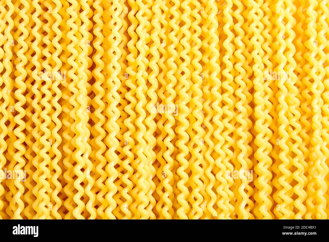 Raw fusilli bucati lunghi italian pasta Stock Photo - Alamy
