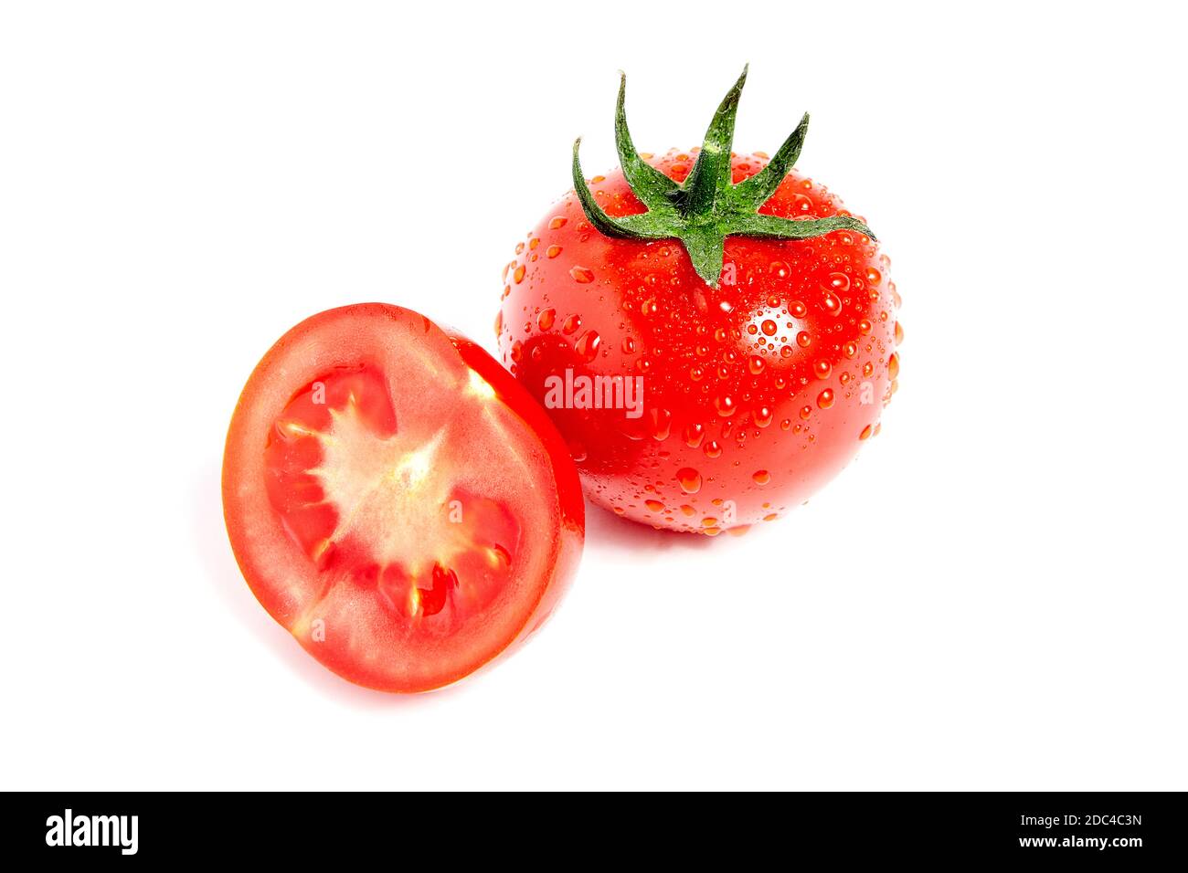 Red ripe Tomato with drops of water. Whole and a half. Isolated on ...