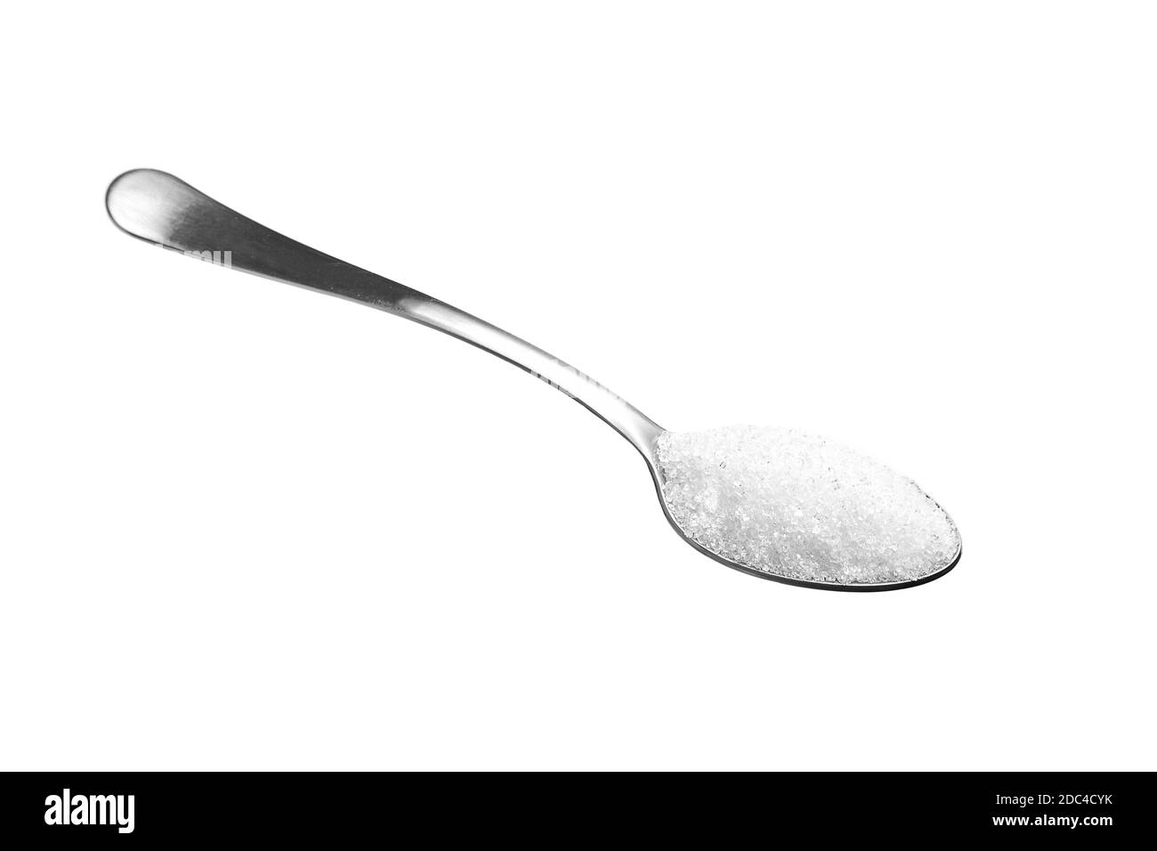 a teaspoon of stainless steel with white sugar, isolated on white ...