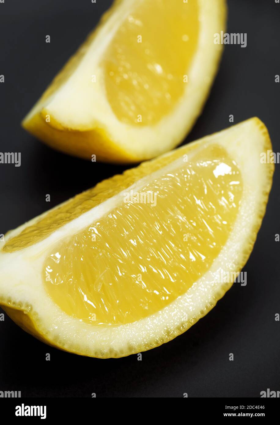YELLOW LEMON citrus aurantifolia, QUARTER OF FRUIT Stock Photo - Alamy