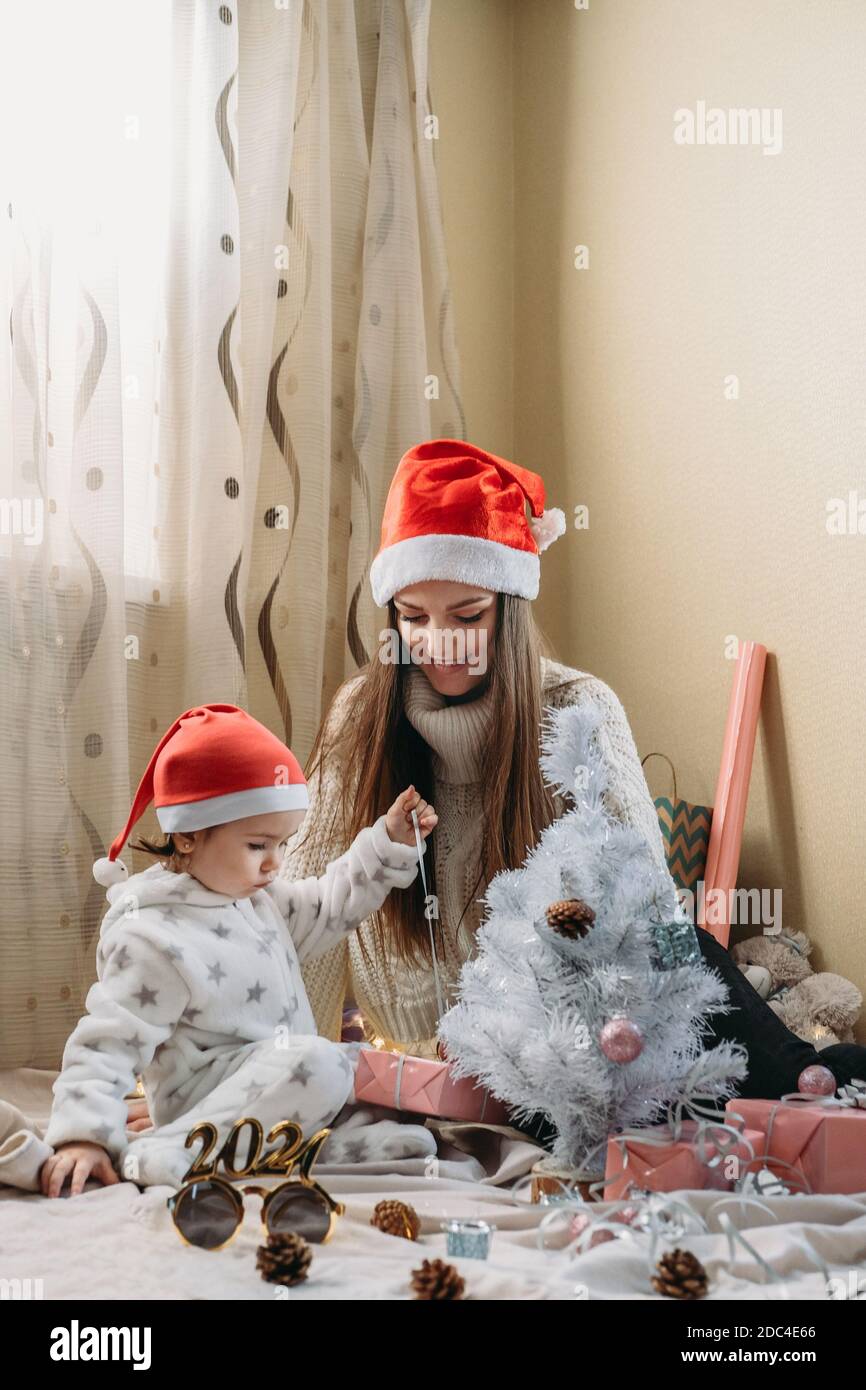 Christmas celebration in new normal. Family celebrating Christmas in ...