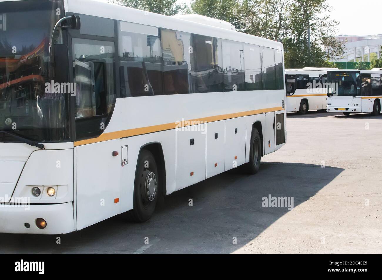 big tourist buses on parking Stock Photo - Alamy