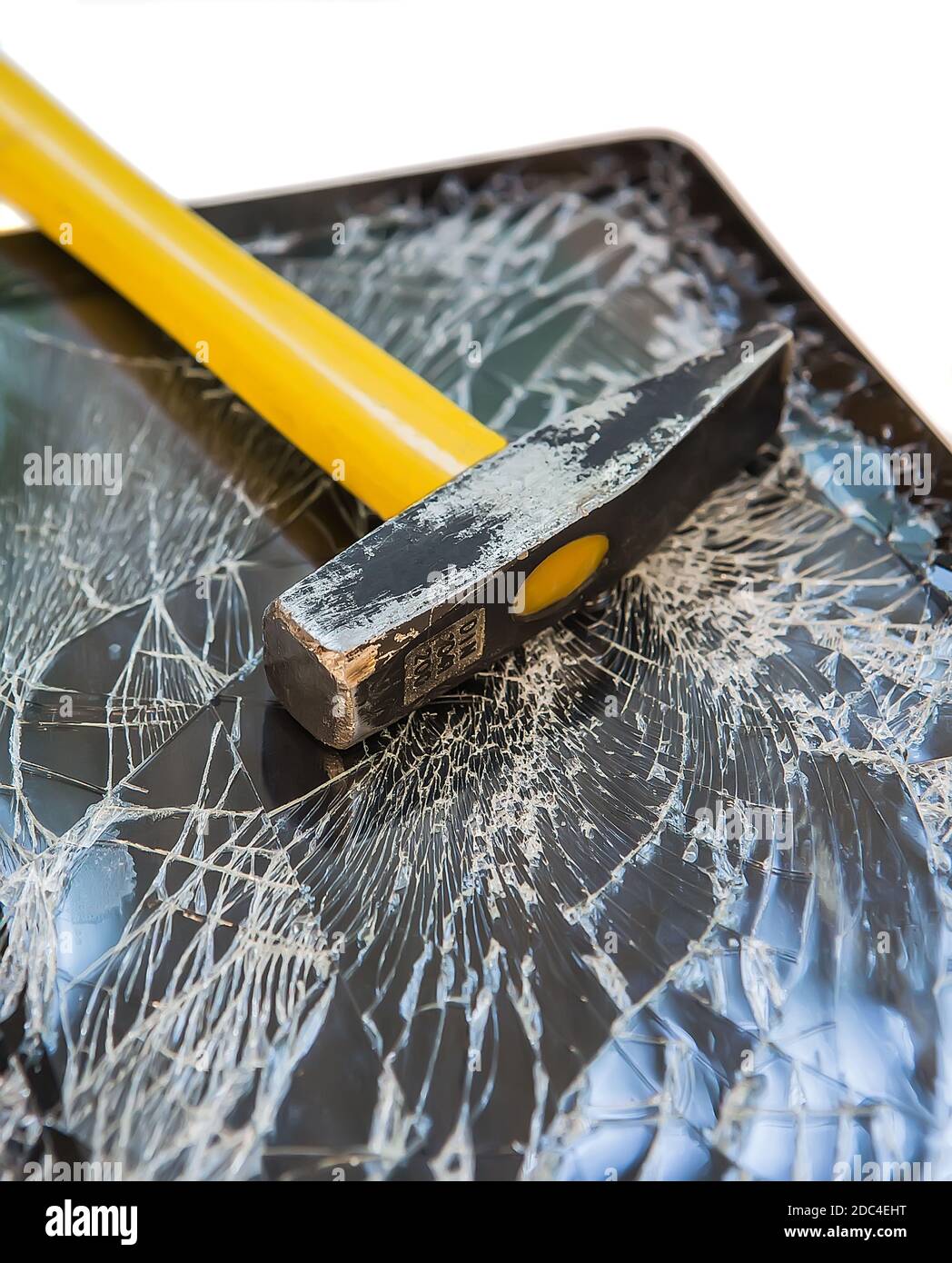hammer on the broken display tablet Stock Photo - Alamy