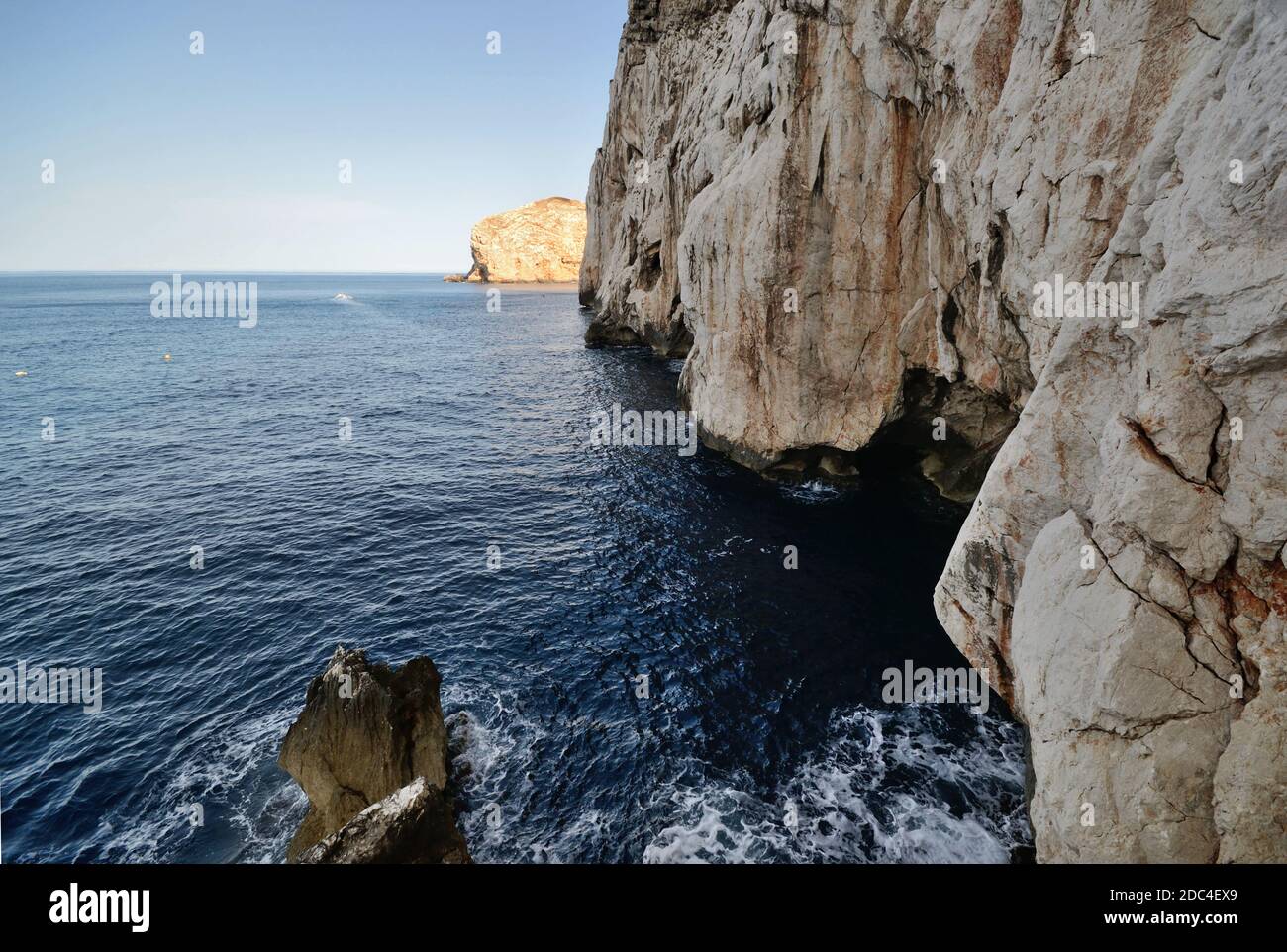 the gap in the rock through which people enter the Neptune caves Stock ...