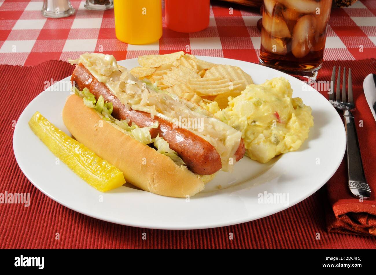 A polish sausageon a deli bun with sauerkraut Stock Photo - Alamy