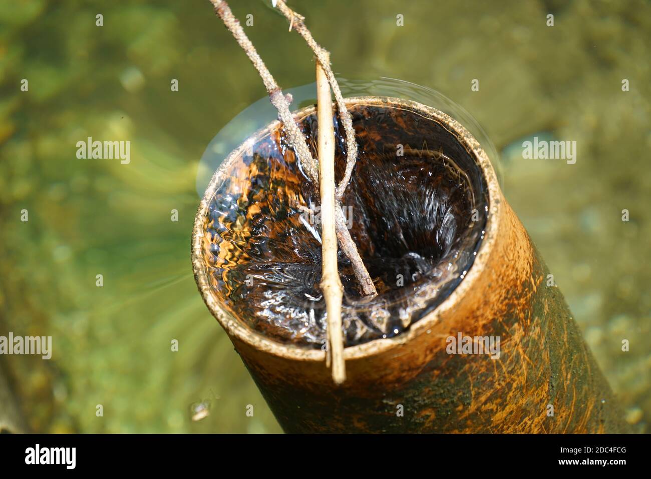 Drain pipe through which apparently clean water flows Stock Photo - Alamy