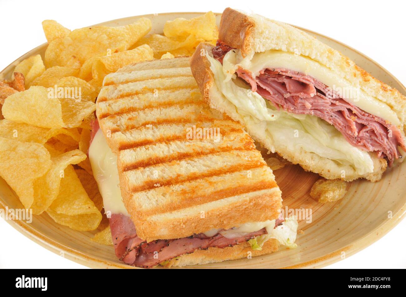 Close up photo of a roast beef and swiss cheese panini with potato ...