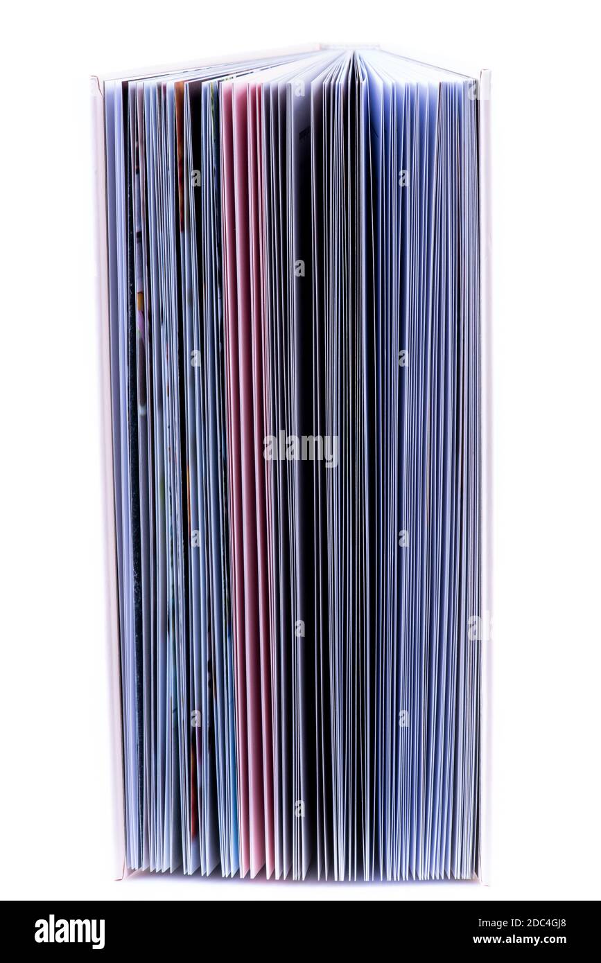 Single open book standing on white background Stock Photo - Alamy