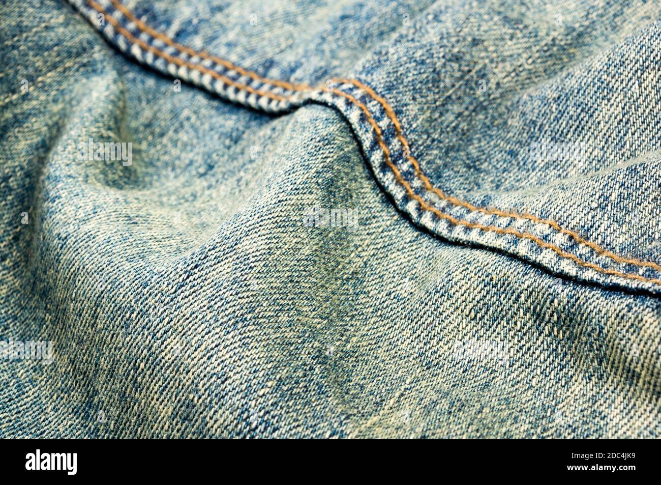 clothing items blue washed faded jeans cotton fabric texture with seams ...