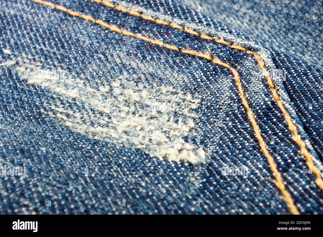 clothing items blue washed faded jeans cotton fabric texture with seams ...