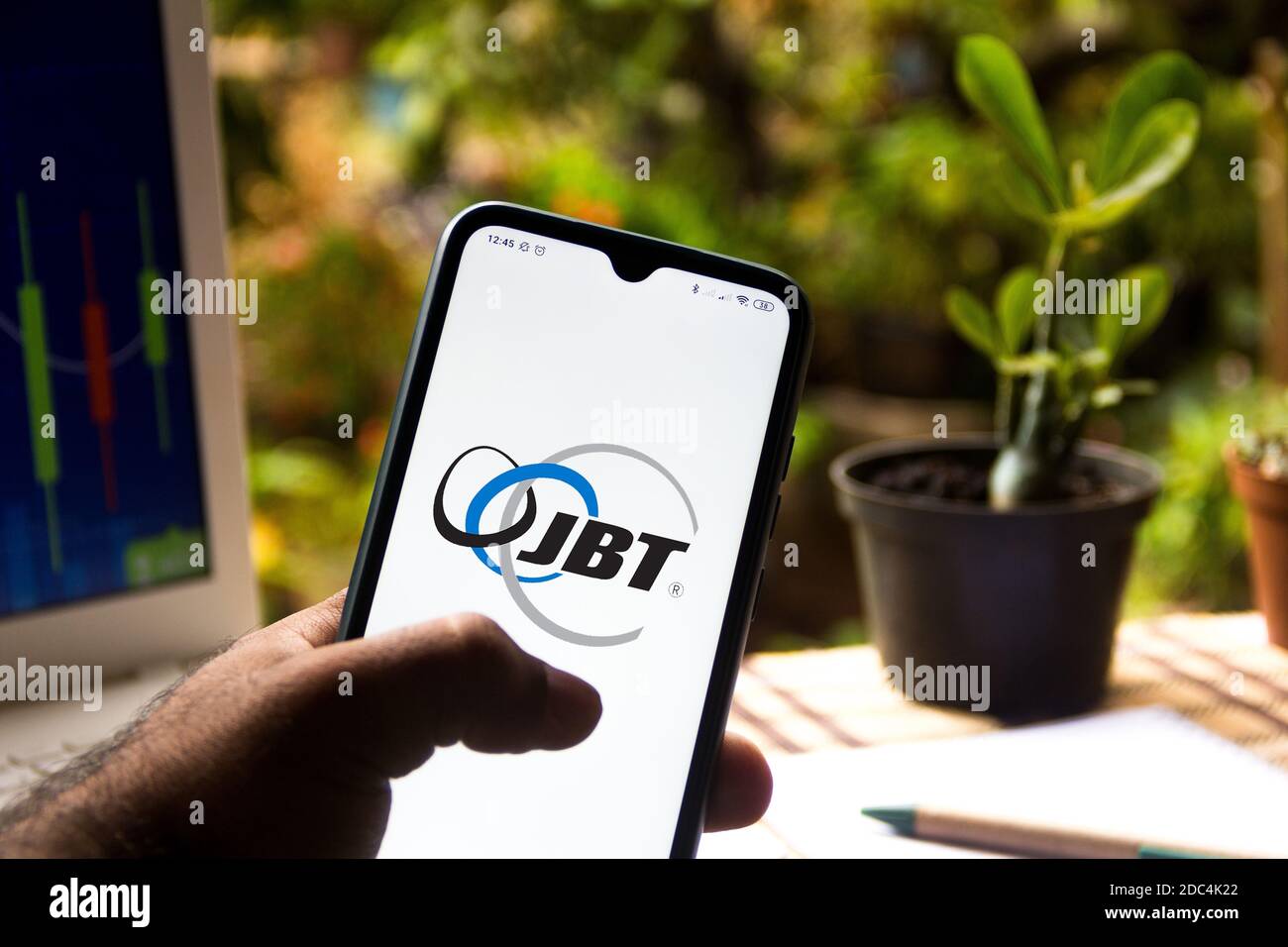 In this photo illustration the JBT Corporation logo seen displayed on a ...