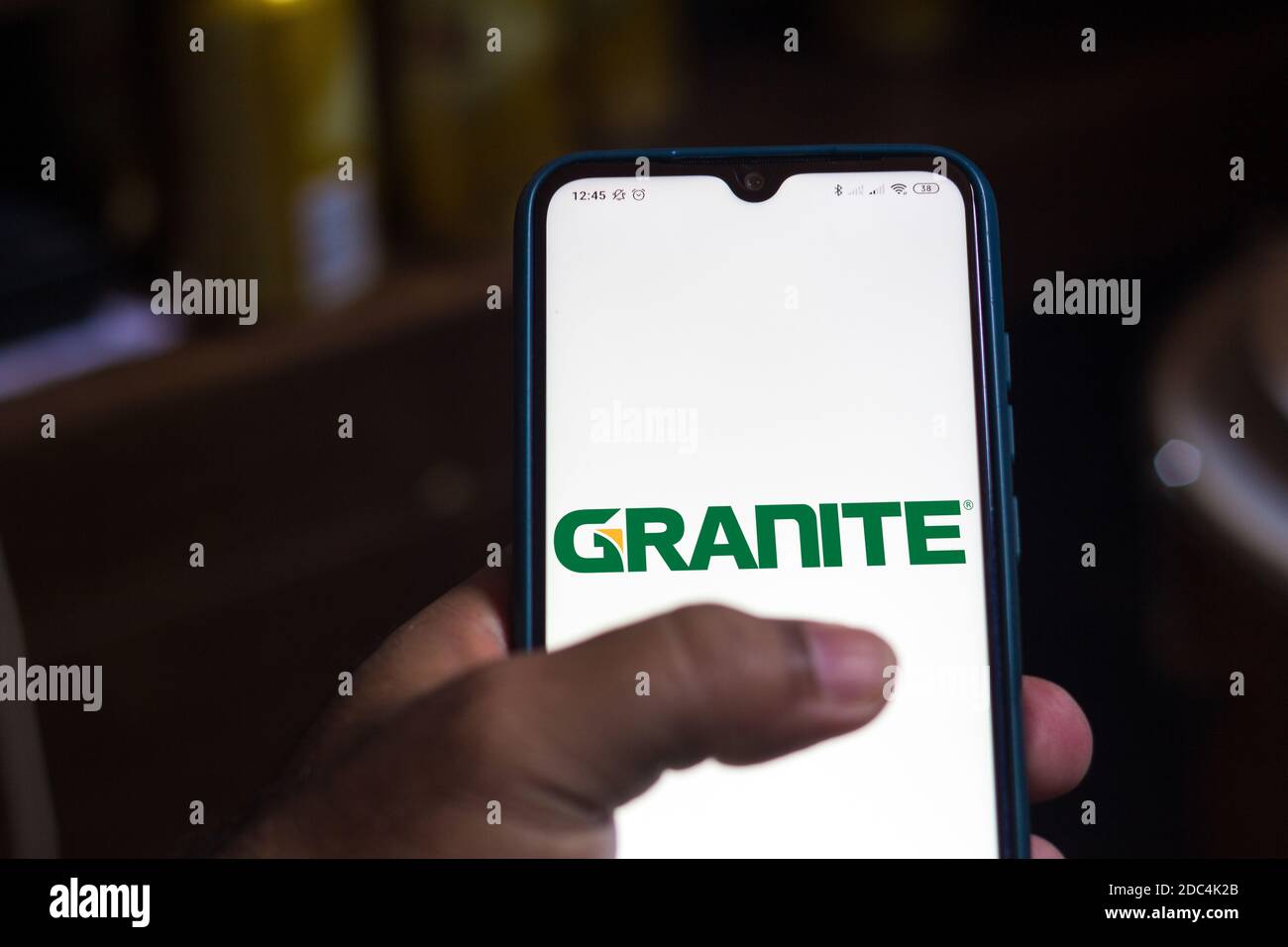 In this photo illustration the Granite Construction logo seen displayed ...