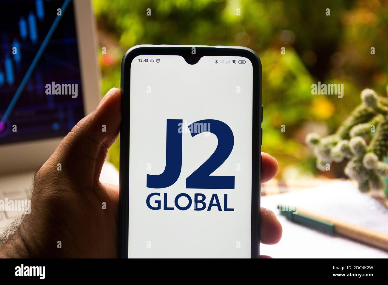 In this photo illustration the J2 Global logo seen displayed on a ...