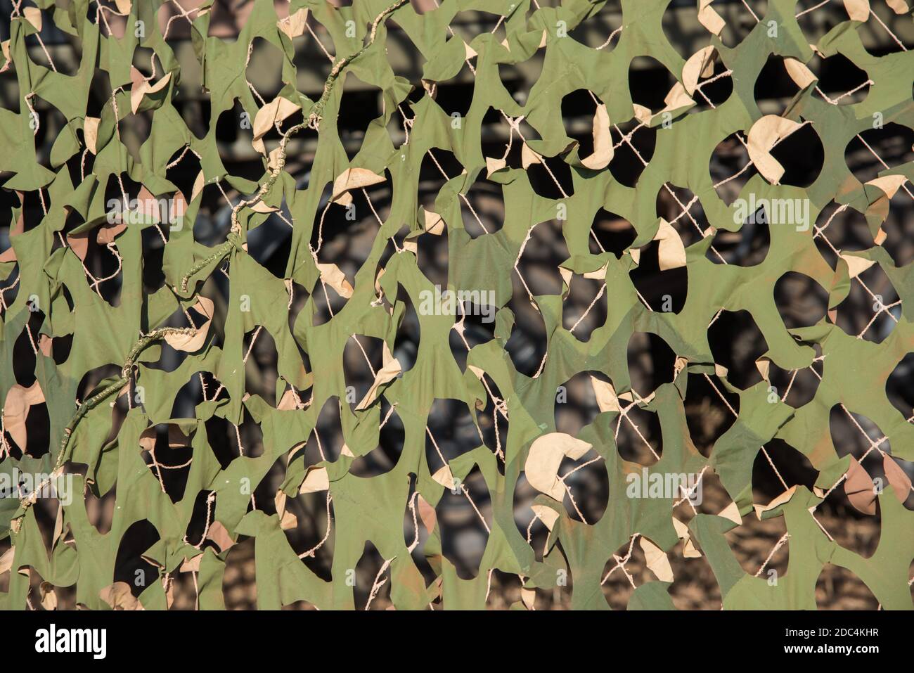 Close-up of camouflage military netting in full frame background detail ...