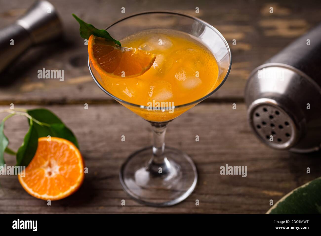 Orange martini cocktail in rustic style Stock Photo - Alamy