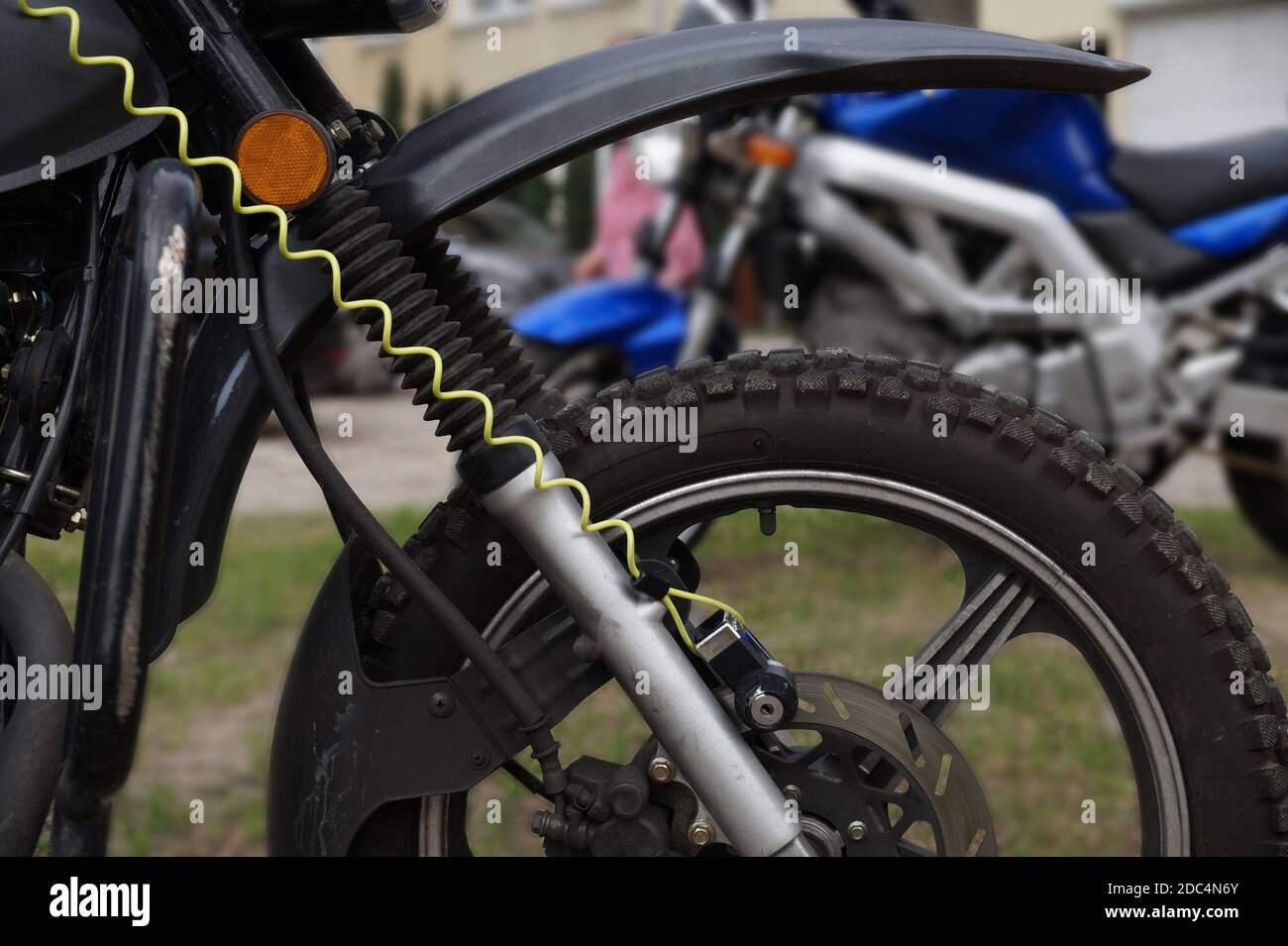 View of the front wheel of the motorcycle with a tire for off-road ...