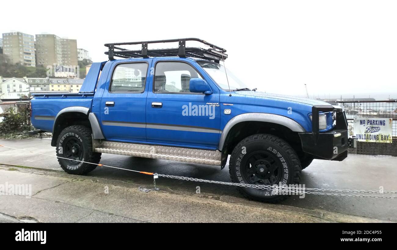 A 1999 blue Toyota Hilux pick up truck parked up in Torquay, Devon ...