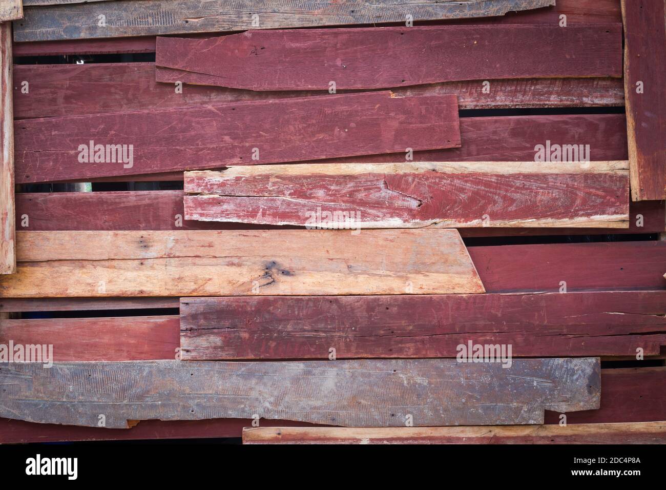 irregular horizontal wood dark brown plank texture background, with ...