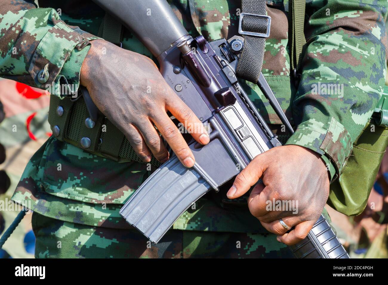 Machine gun hold hands hi-res stock photography and images - Alamy