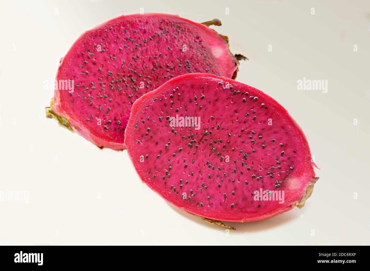 Red-skinned dragon fruit or pitaya with red flesh. Native to the ...