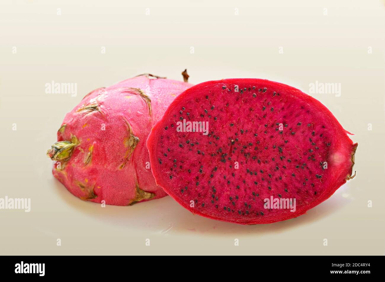 Red-skinned dragon fruit or pitaya with red flesh. Native to the ...
