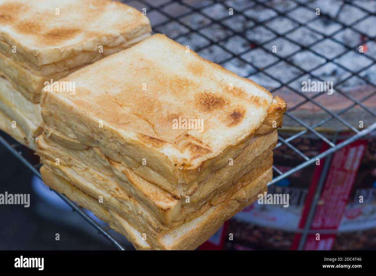 closeup grilled bread toast on thai traditional stove Stock Photo - Alamy