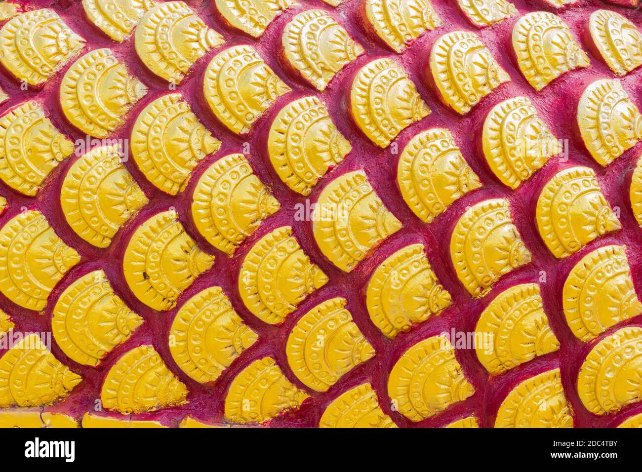 sculpture of golden dragon scale or Fish scale textures in Thai temple ...