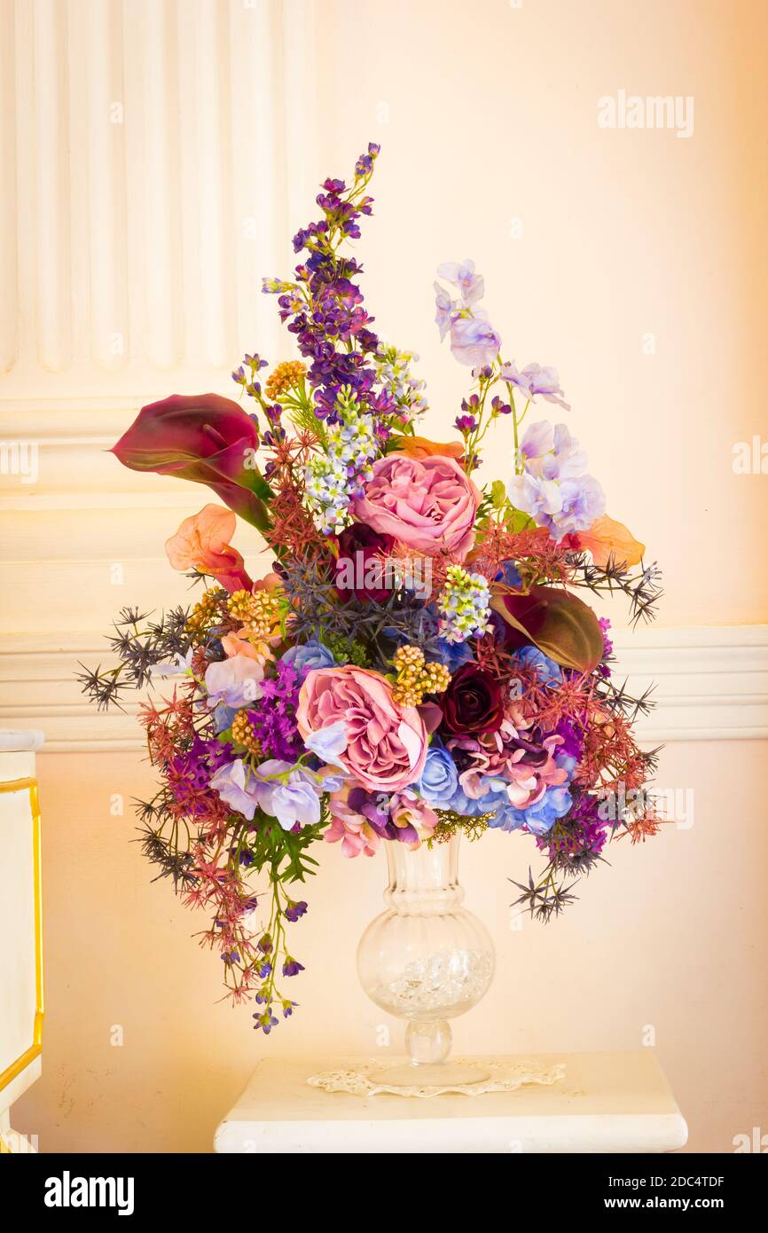Bouquet flower in the vintage vase on the yellow background Stock Photo ...