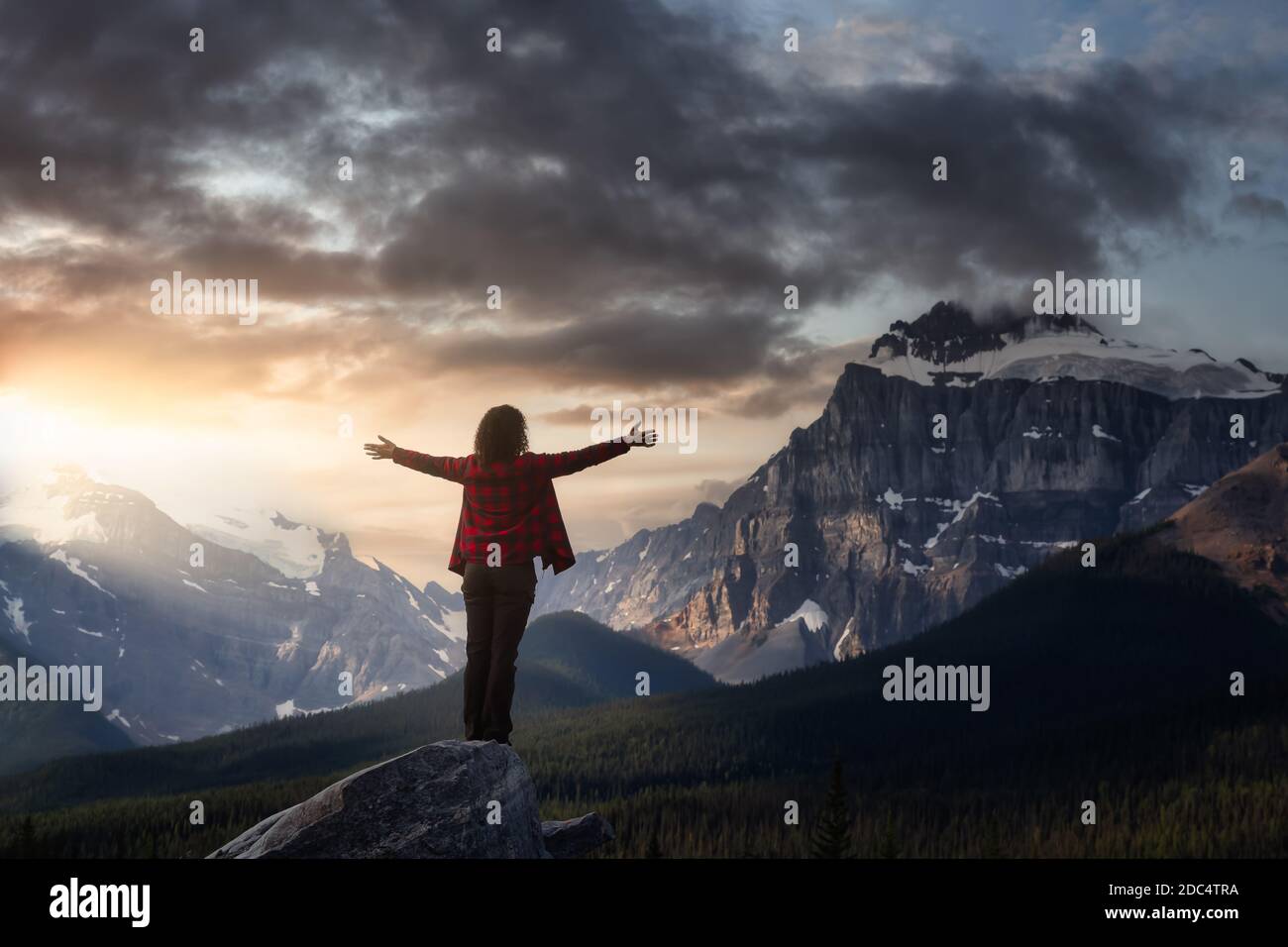 Girl enjoying the beautiful scenery of the Canadian Rockies Stock Photo ...