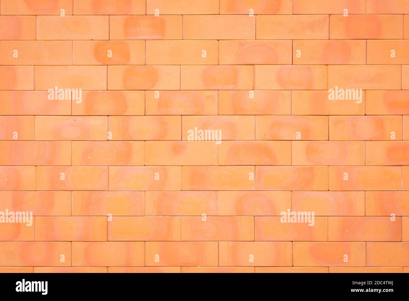 new brick wall and water stain after raining, vertical Stock Photo - Alamy