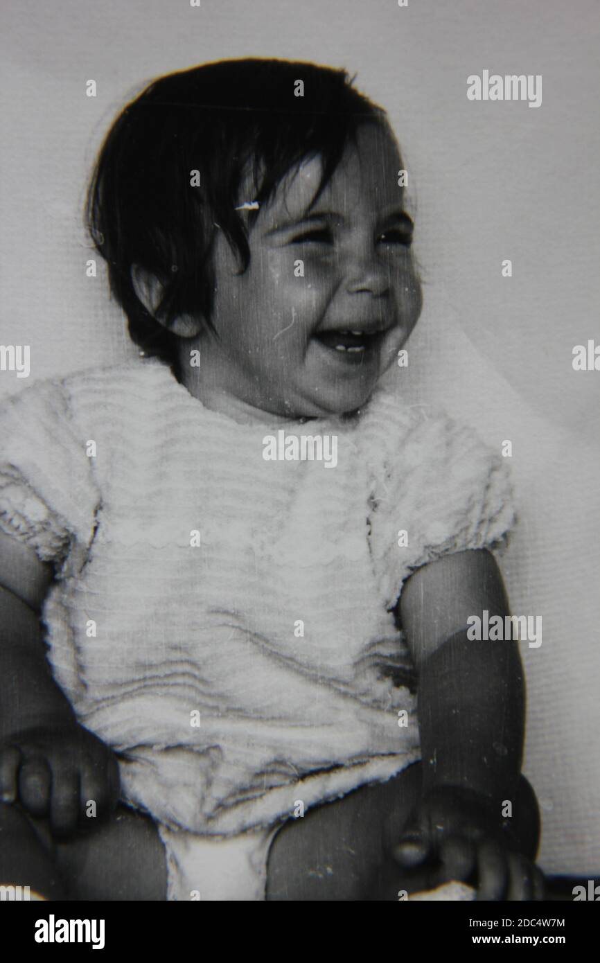 Fine 1970s vintage black and white photography of a happy and beautiful ...