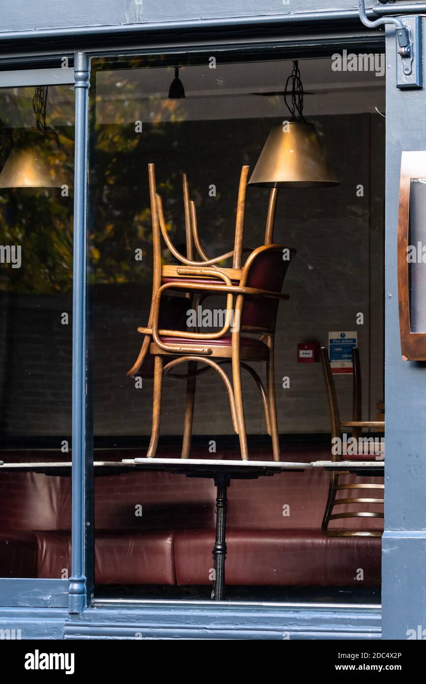Window of an empty restaurant forced to close amid COVID-19 pandemic ...