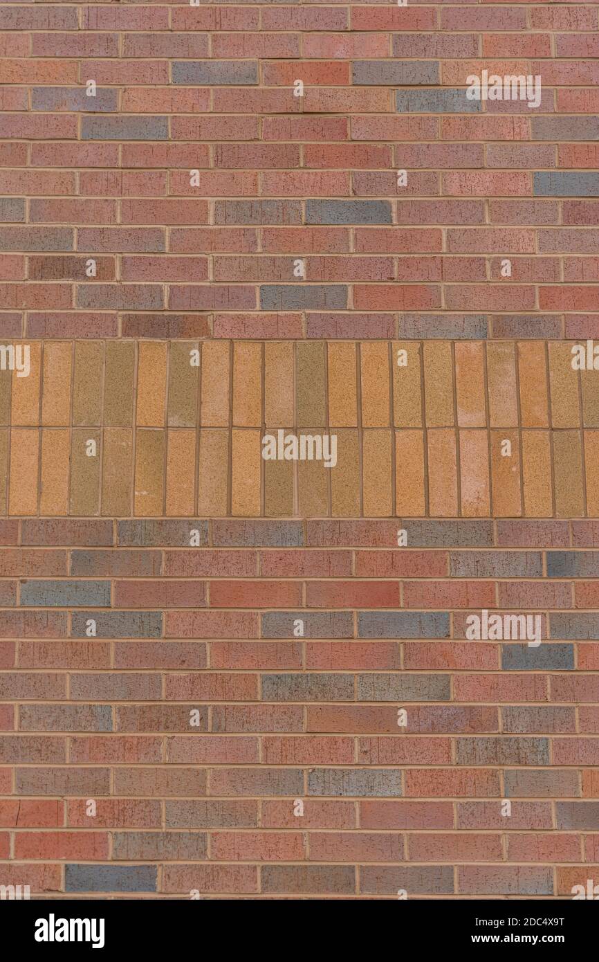 decorative rectangular pattern siding with brick veneer on a new strip ...