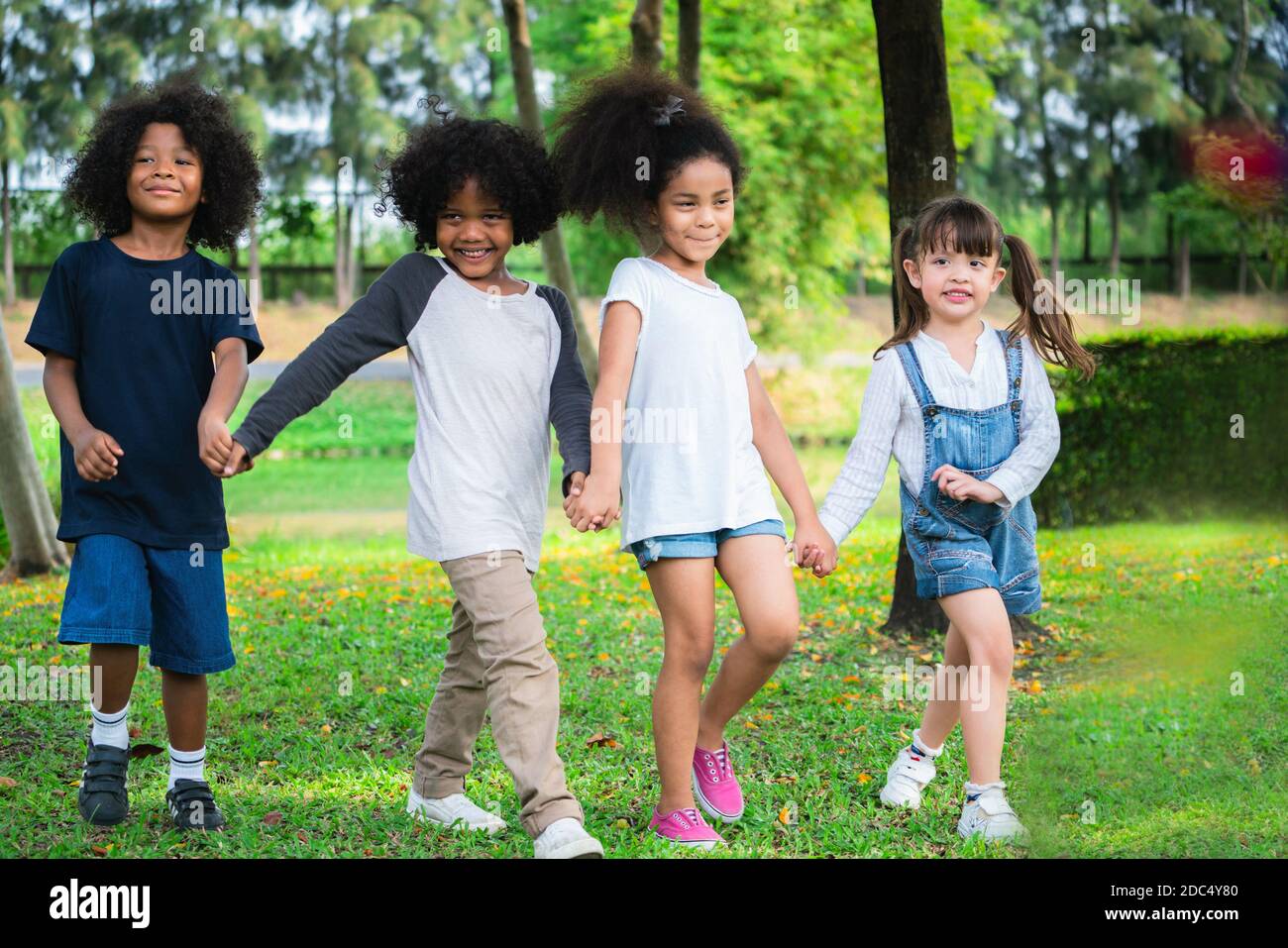 African american kids walking to school hi-res stock photography and ...