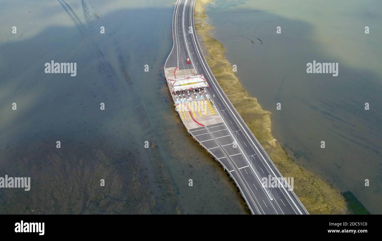 High Quality Aerial Highway Sea from Above. The toll gate of Bali ...