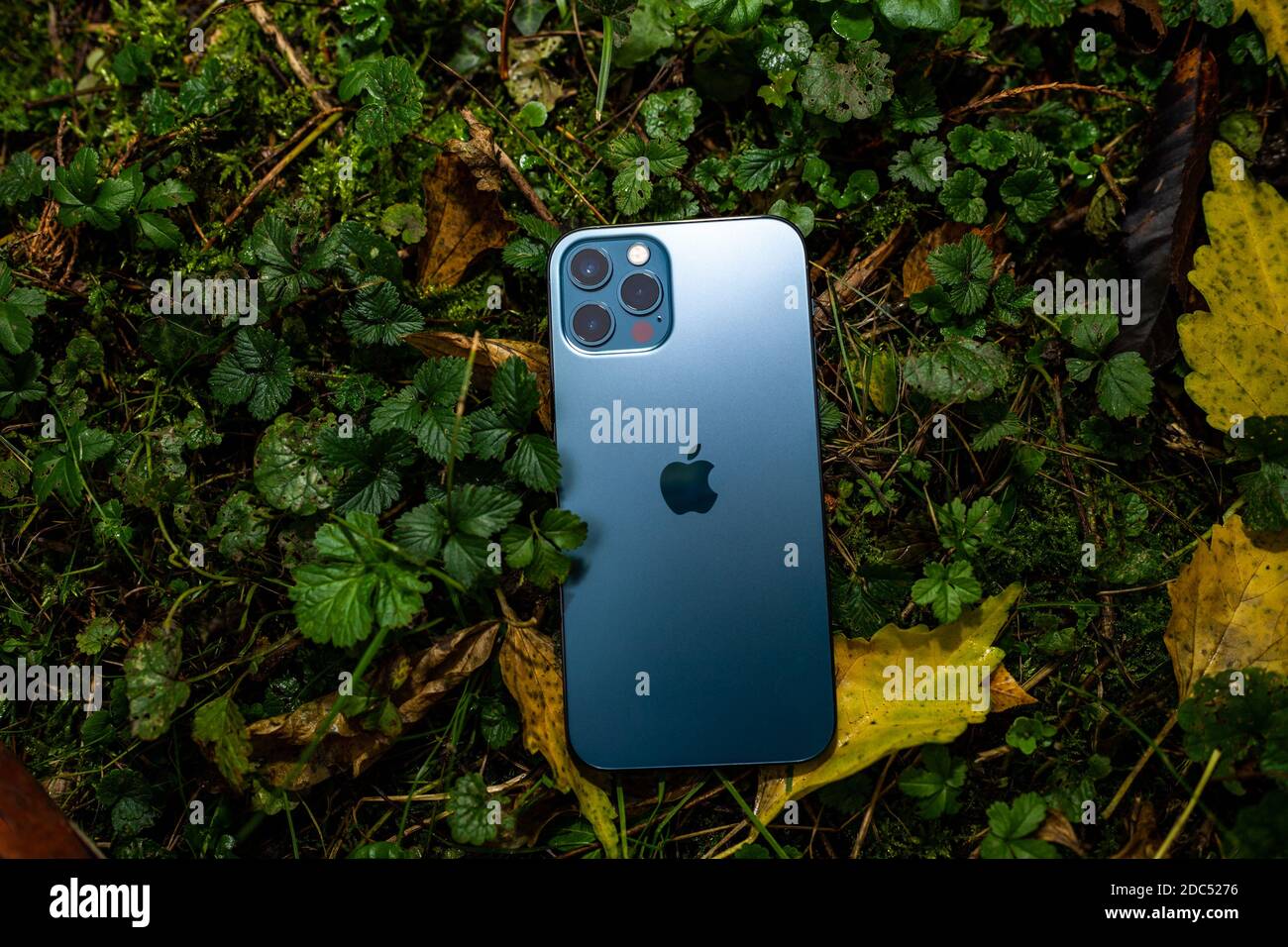 Paris, France - Nov 11, 2020: Apple Computers background the new iPhone ...