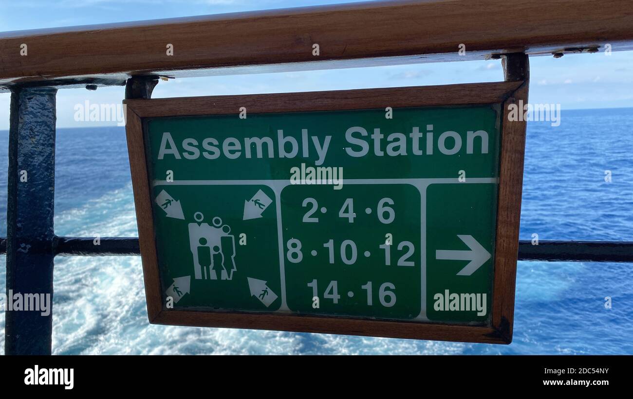 A cruise ship sign designating where the assembly station is in case of ...