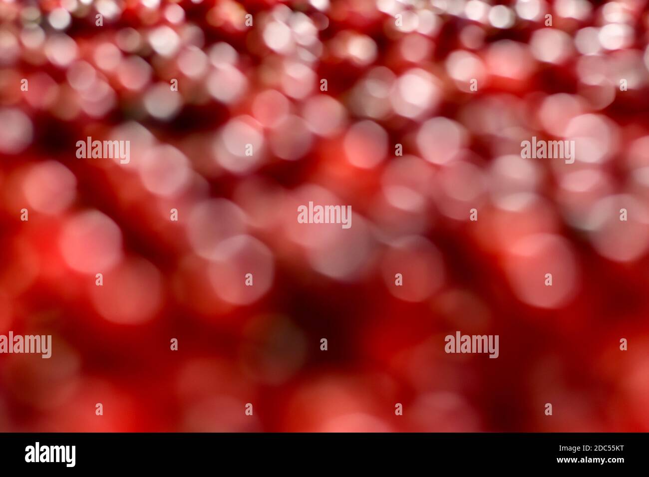Background with bright red and white circles of different sizes, with ...