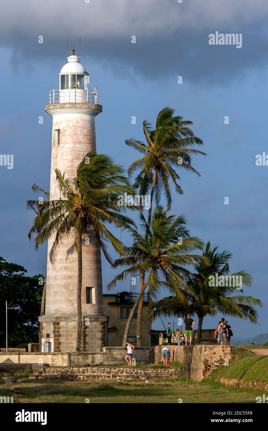 Tourists gather at the base of the lighthouse at Point Utrecht Bastion ...