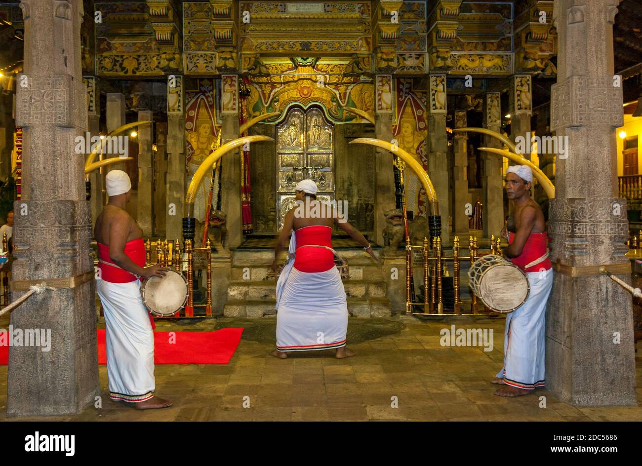 A Buddhist ceremony with Sri Lankan drummers taking place in front of ...